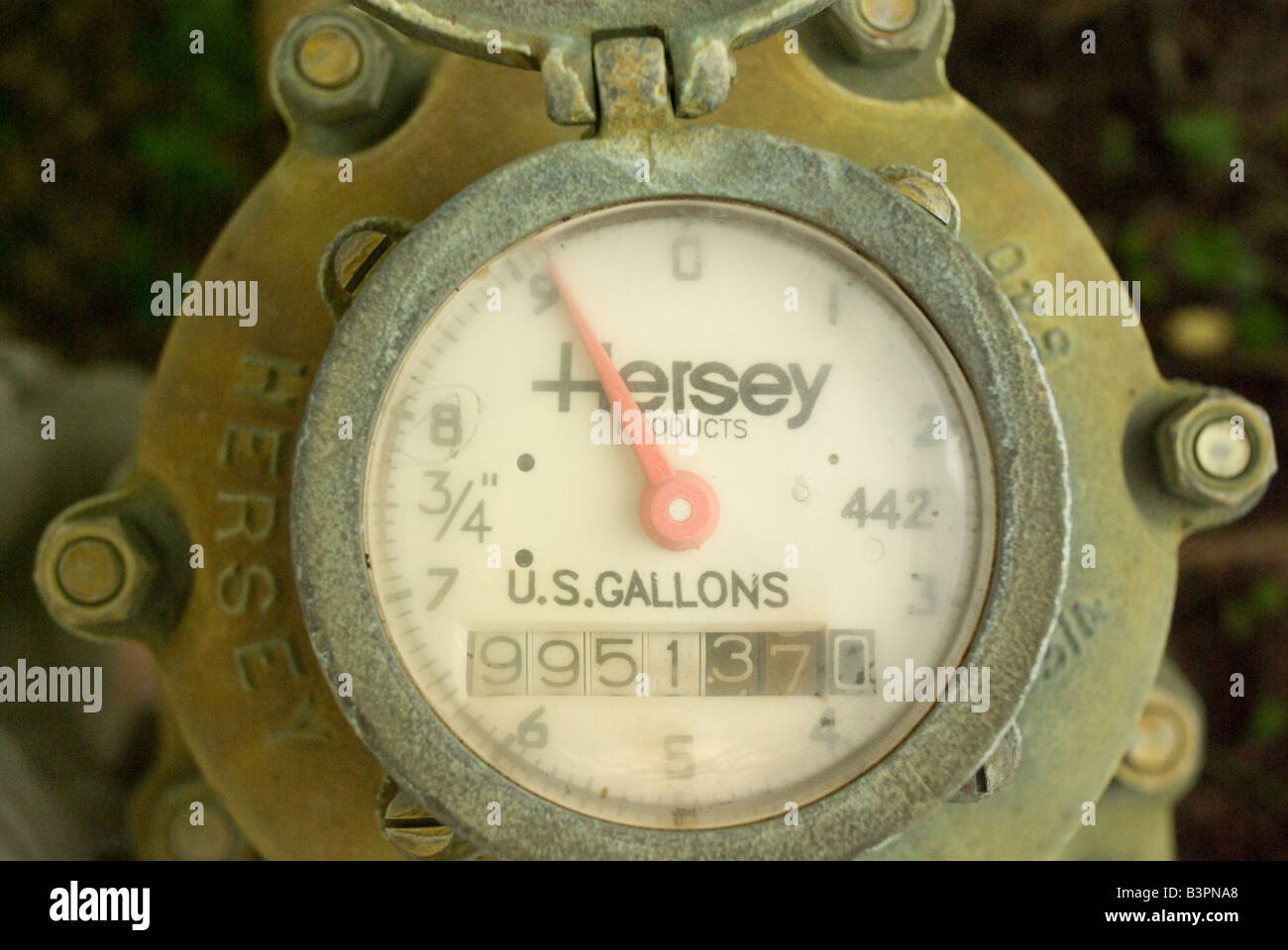 A water gauge measures the flow of water through old pipes Stock Photo ...