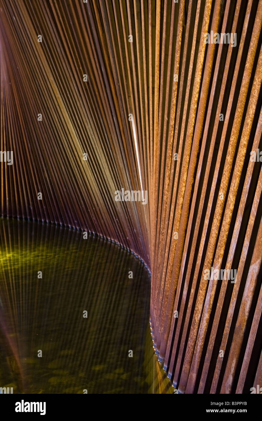 Art wall made from train track rails at Tanner Springs Park, Portland ...