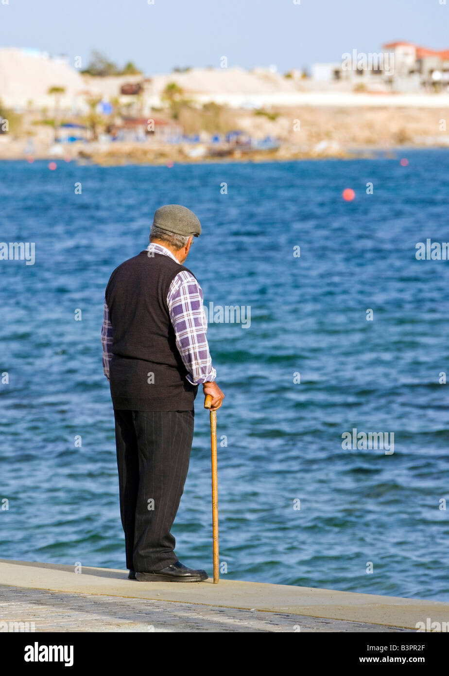 Old man with cane hi-res stock photography and images - Alamy