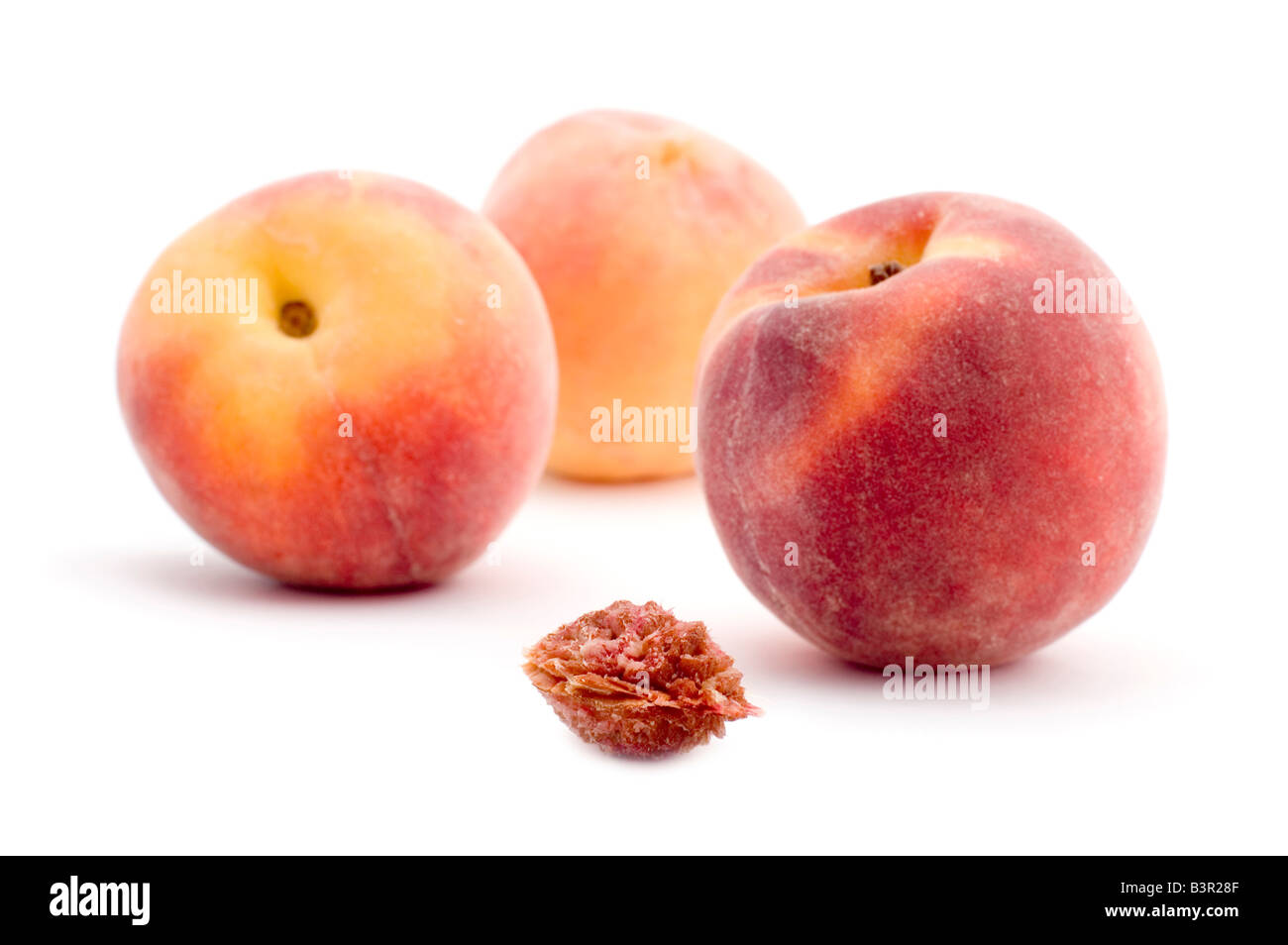 object on white raw food peach Stock Photo - Alamy