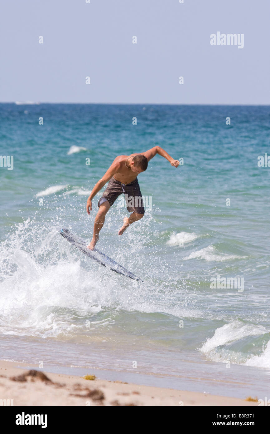 Skimboarder wiping out, Fort Lauderdale, Florida, USA Stock Photo - Alamy