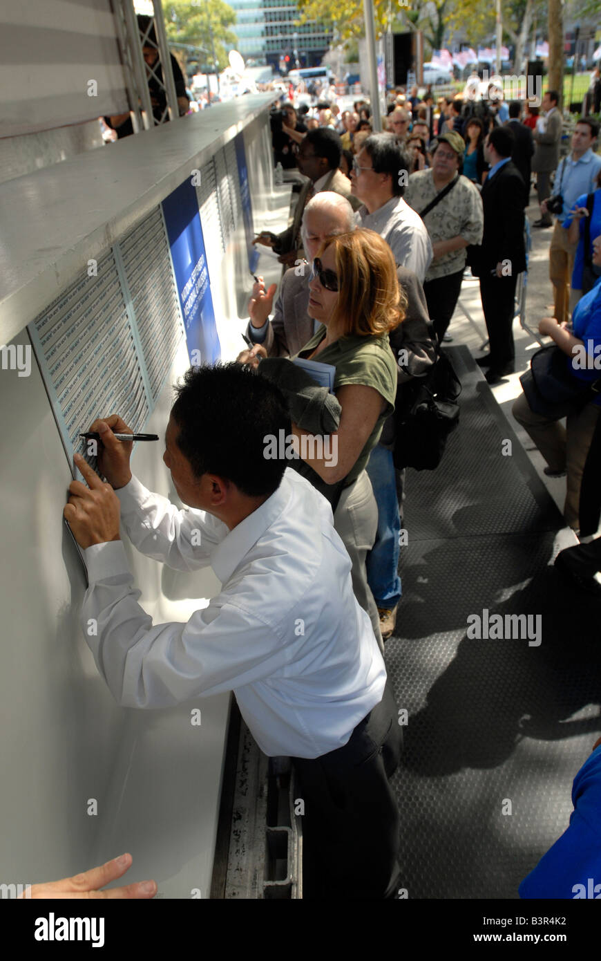 Members of the public sign steel beams to be used in construction of ...