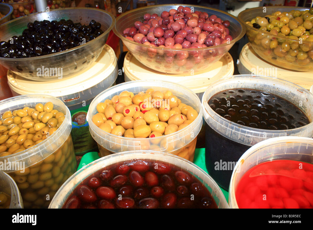 Olives on a market stall, St Cast le Guildo, Cotes d'Armor, Brittany ...
