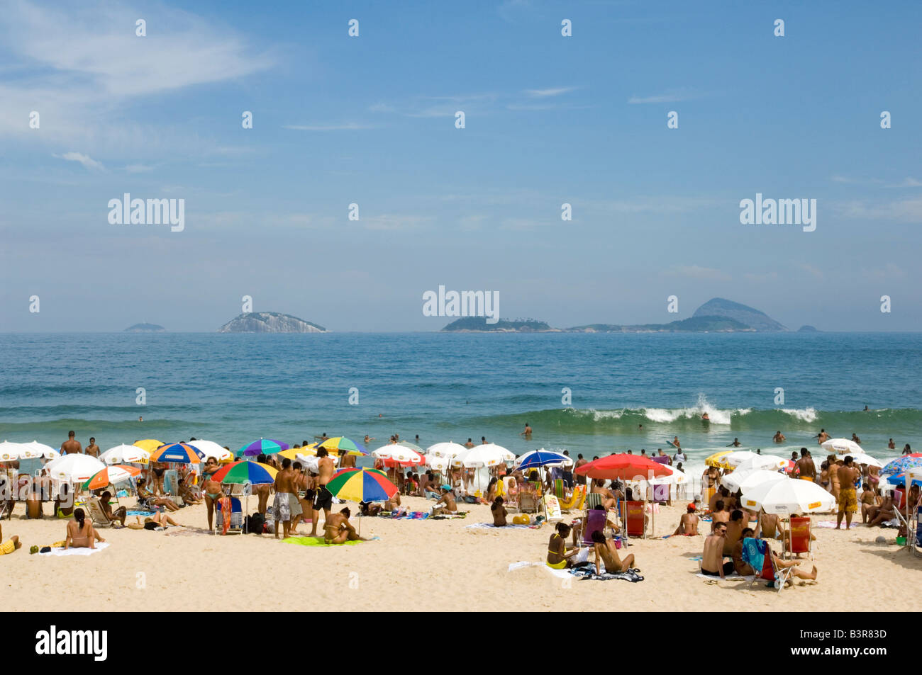 People sunbathe on copacabana beach in rio de janeiro hi-res stock ...