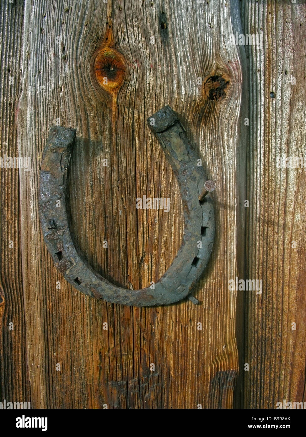 Rusty horseshoe on door hi-res stock photography and images - Alamy
