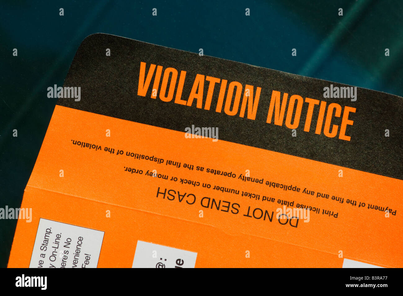 Traffic ticket on a car window Stock Photo - Alamy