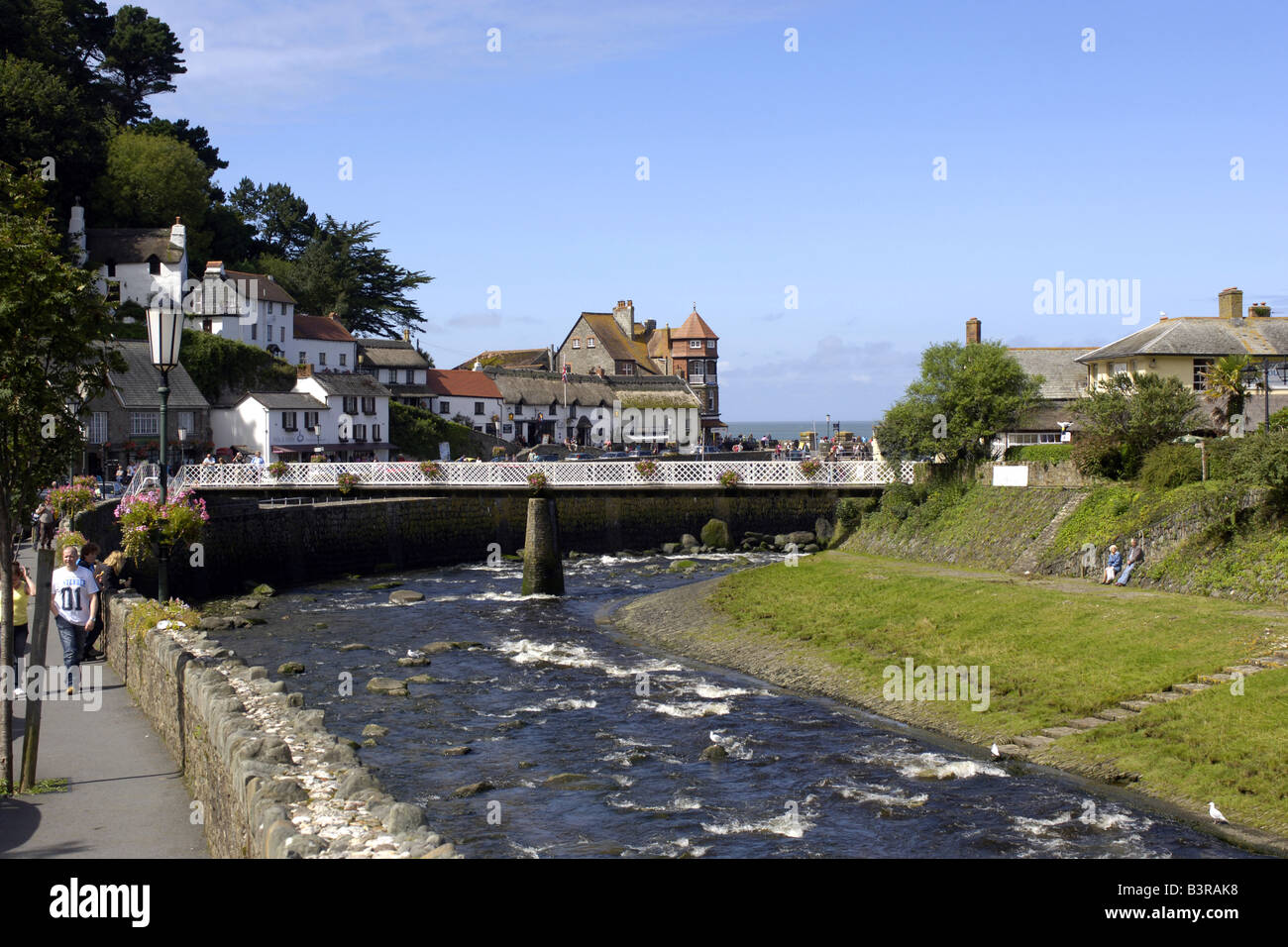 The East Lyn River flowing into the sea at Lynton and Lynmouth N Devon ...
