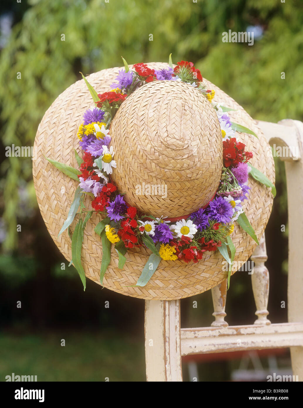 straw hat with flowers Stock Photo - Alamy