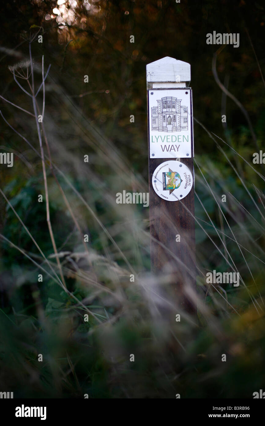 Signs on a public footpath directing walkers to Lyveden New Bield in ...