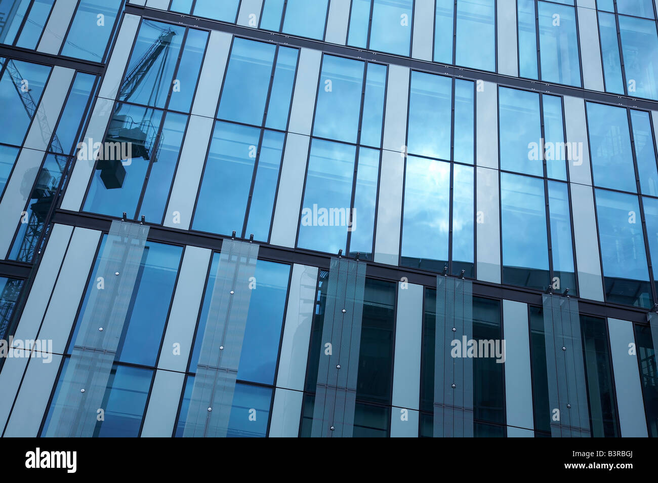 Glass facade modern office block Stock Photo - Alamy