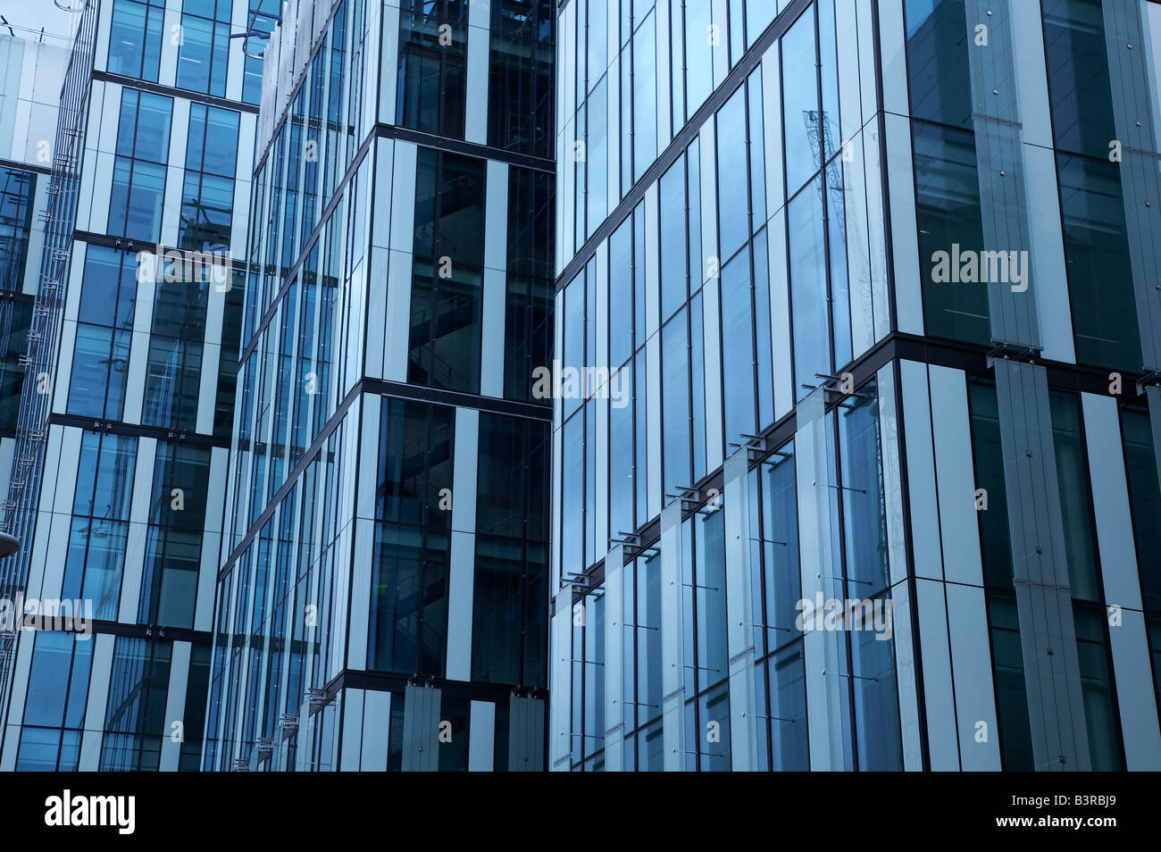 Glass facade modern office block Stock Photo - Alamy