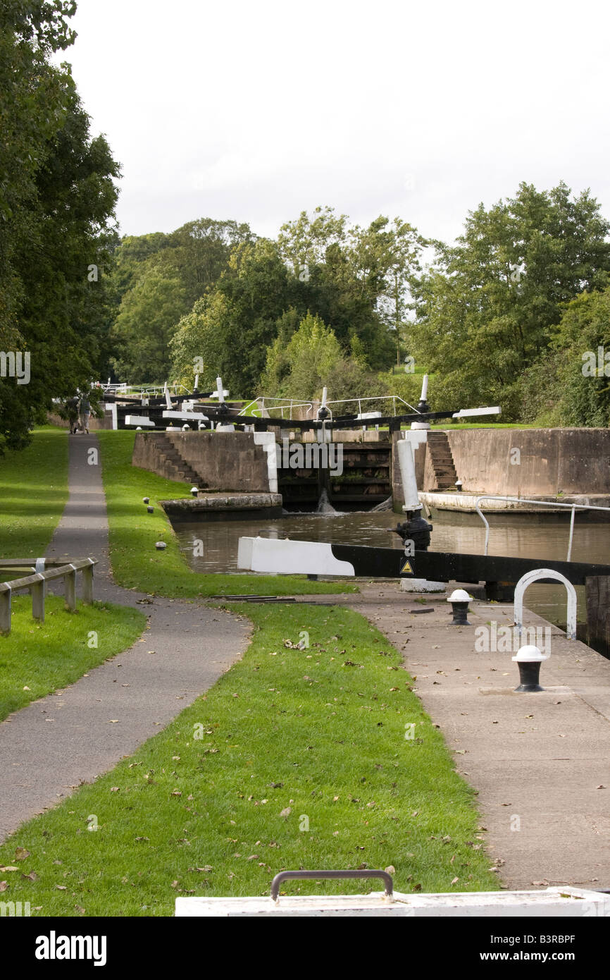 path along side flight of locks at Hatton, Warwickshire England Stock ...