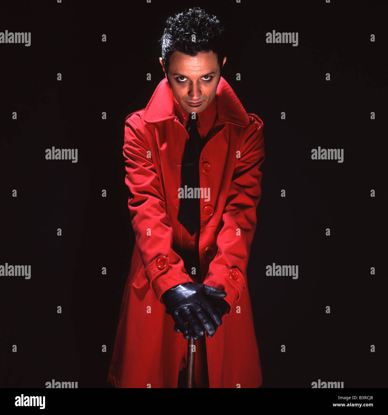 man in red coat Stock Photo - Alamy
