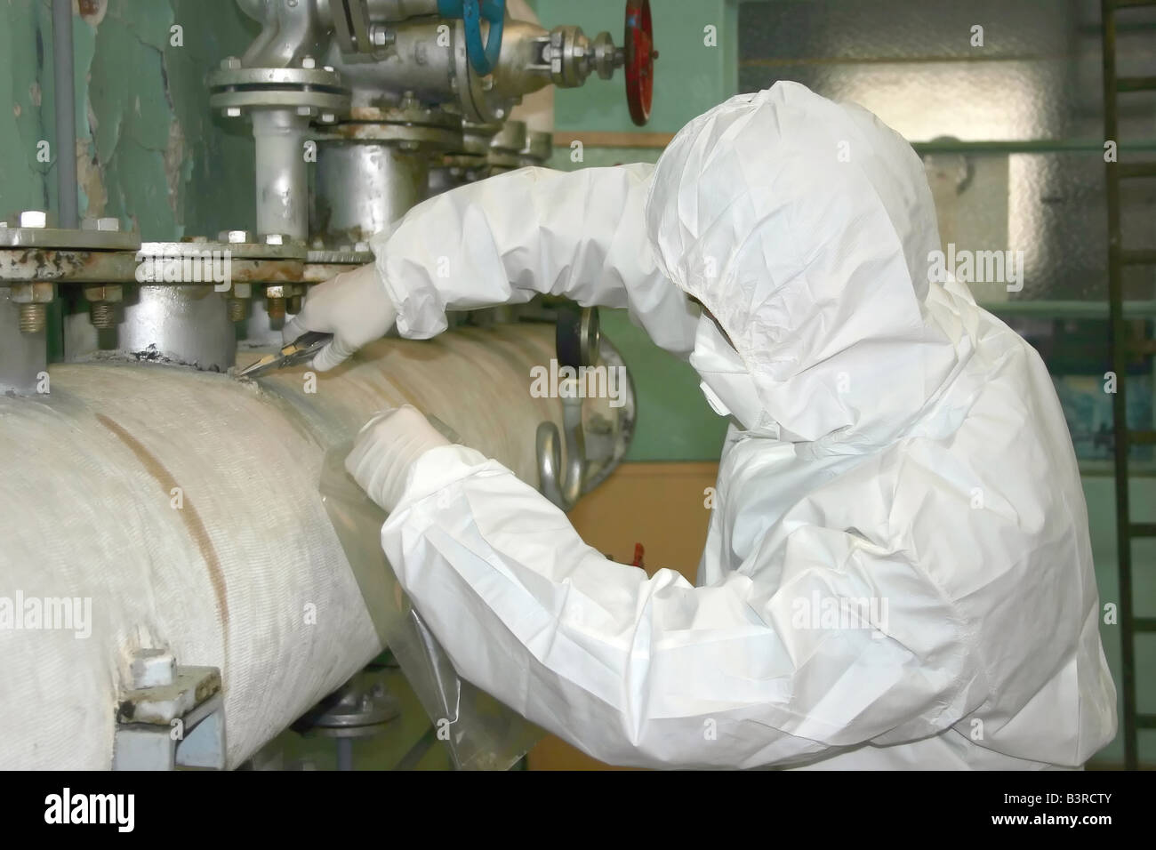 Taking of asbestos in an old factory Stock Photo - Alamy