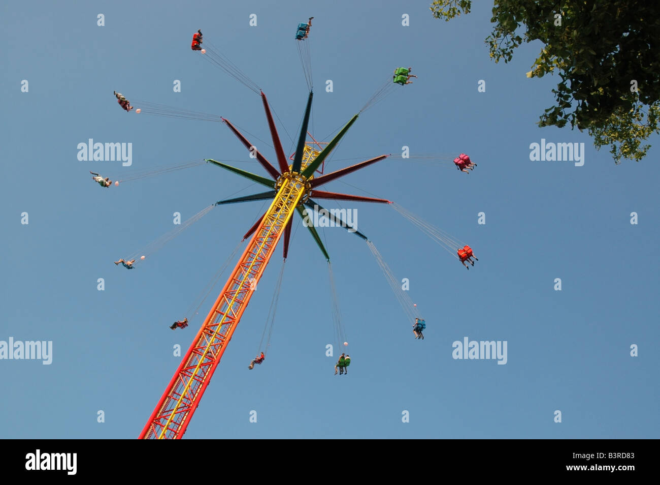colourful fairground ride at dusk Tilburg Netherlands Stock Photo - Alamy