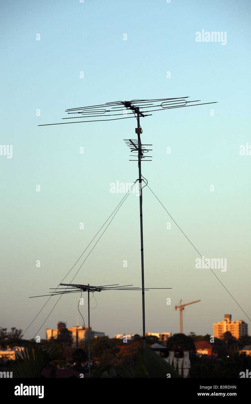 Television aerial on rooftop Stock Photo - Alamy