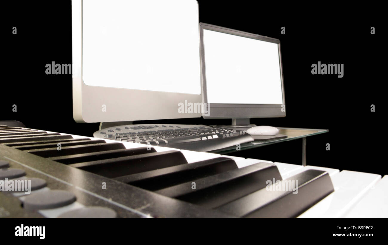 a computer music workstation and keyboard Stock Photo - Alamy