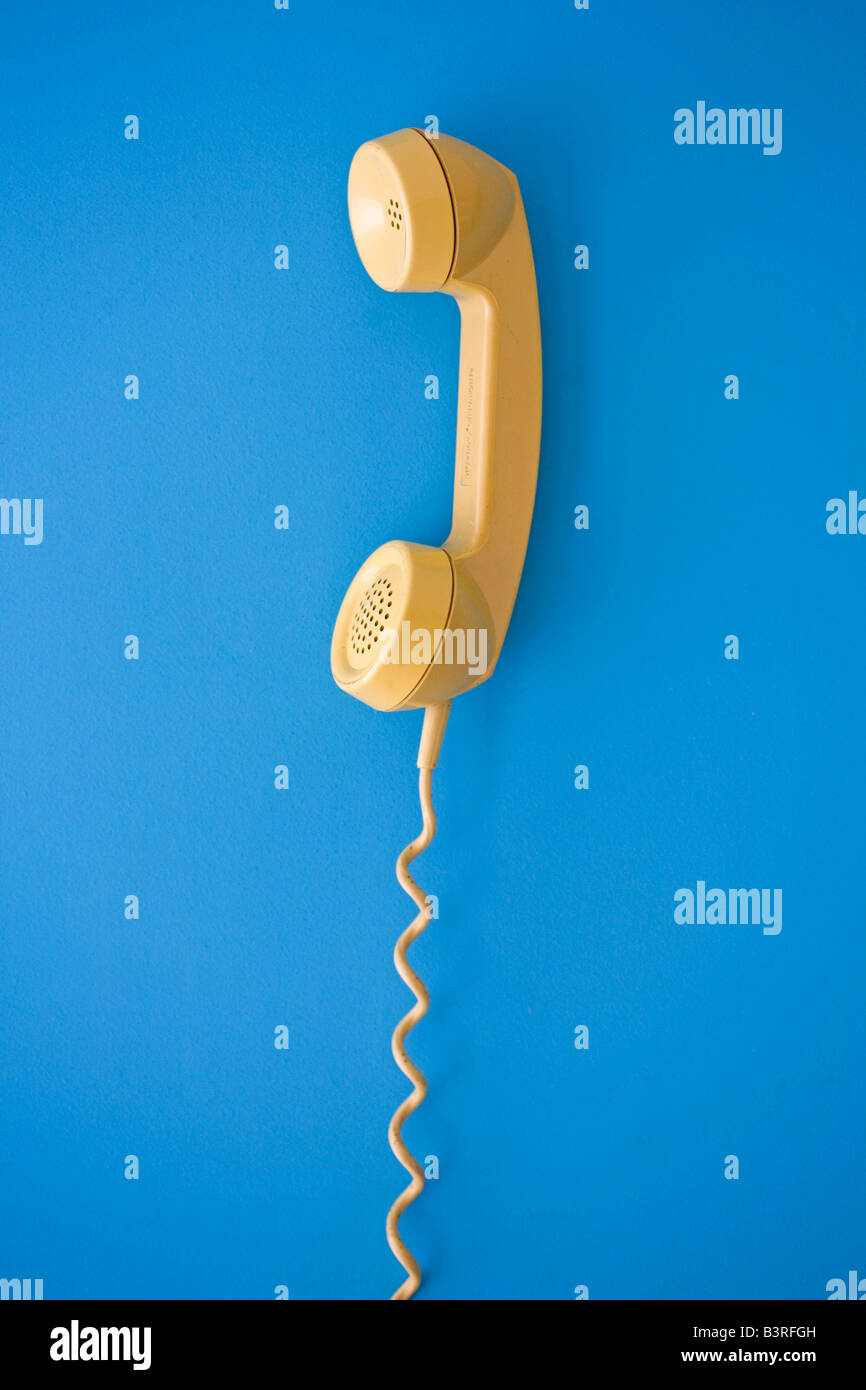 Old fashioned yellow rotary telephone hi-res stock photography and ...
