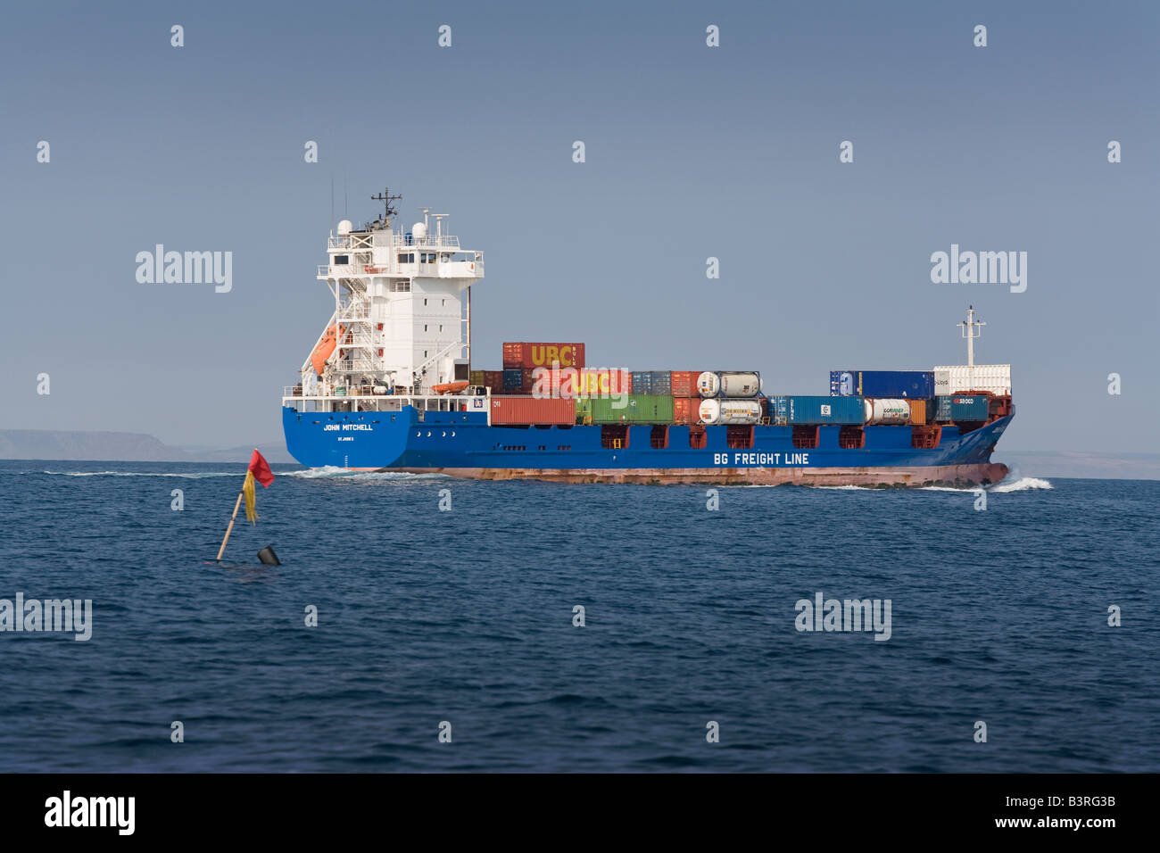 A small to mid size Container ship heading east, up Channel, to a ...