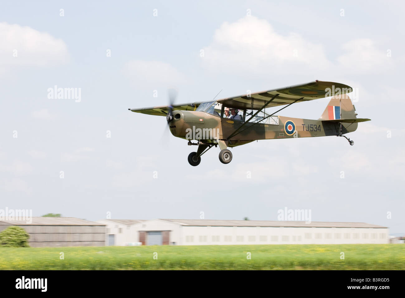 Auster 5 TJ534 G-AKSY in flight taking-off from Breighton Airfield ...