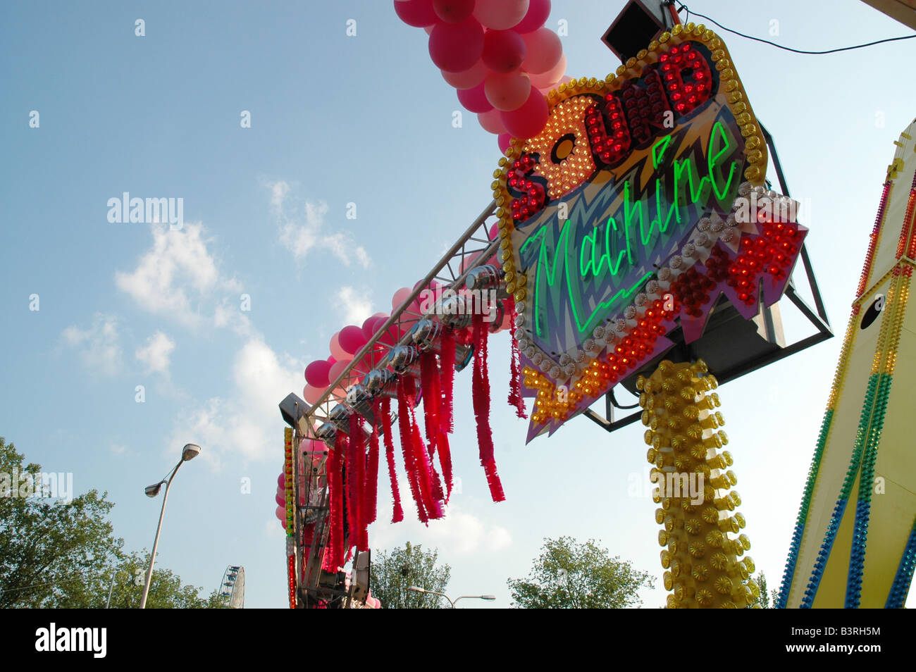 colourful fairground at dusk Tilburg Netherlands Stock Photo - Alamy