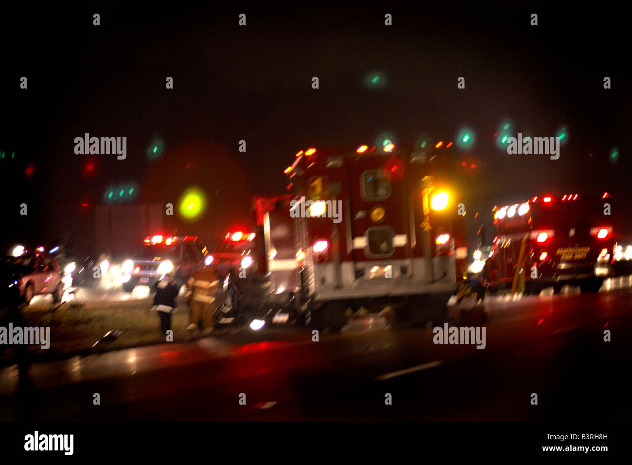 A fire engine at an accident scene on a highway Stock Photo - Alamy