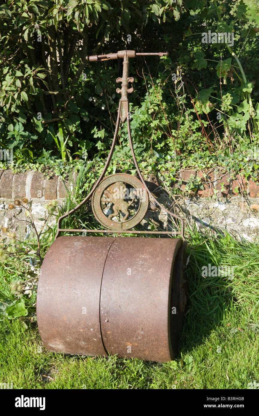 Garden Roller Leaning up against a low wall Stock Photo - Alamy