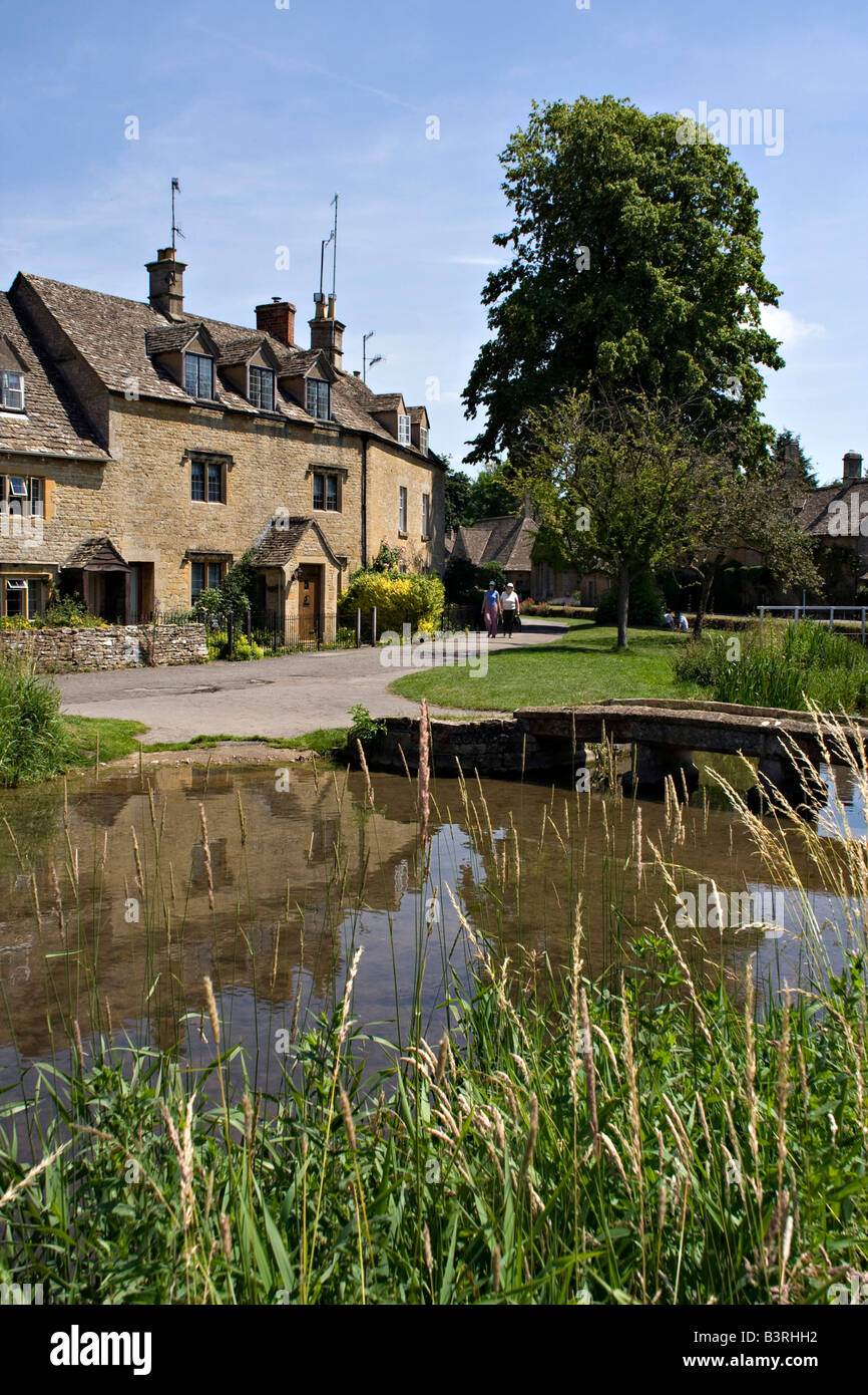 Lower Slaughter quaint village by stream cotswolds stone houses england ...