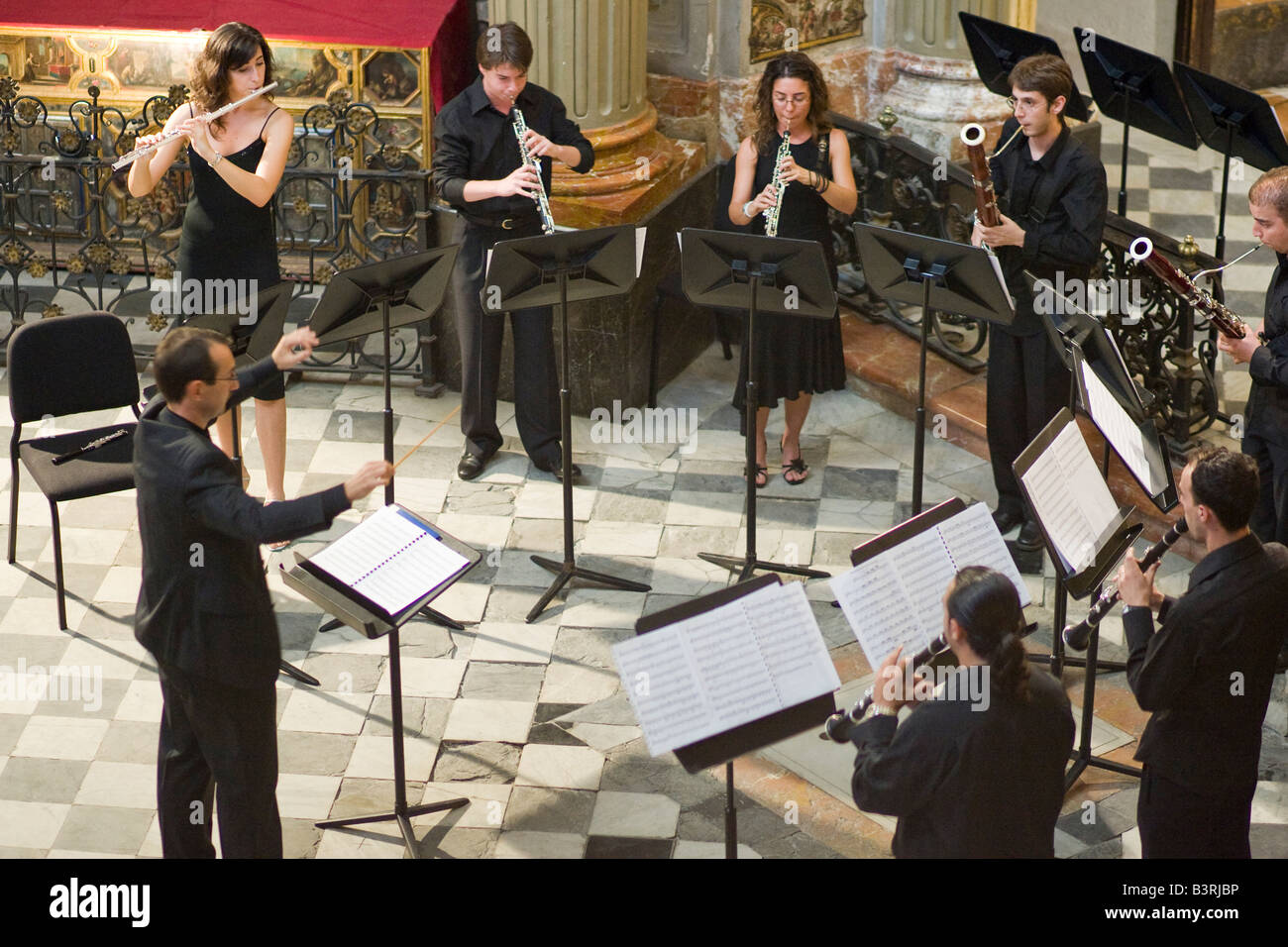 Classical music ensemble performing in San Luis de los Franceses church ...