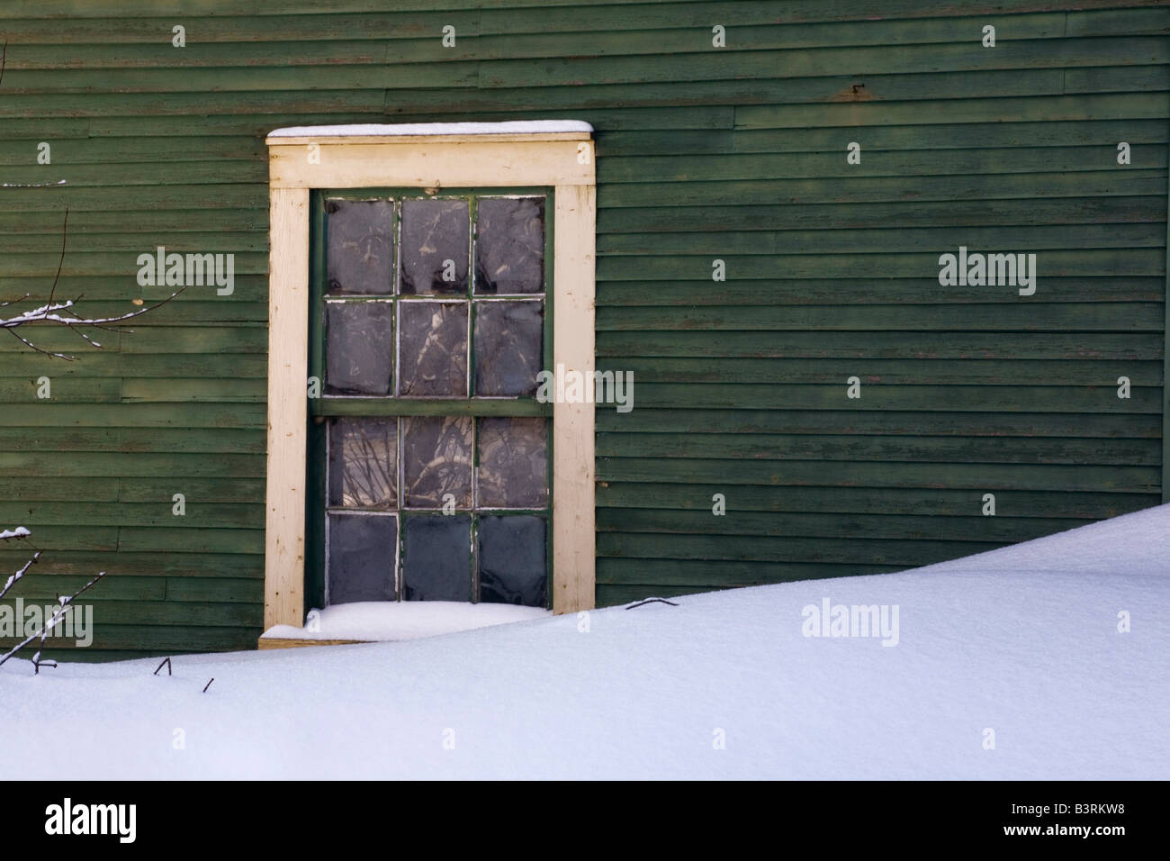 Snow drift near window Stock Photo - Alamy