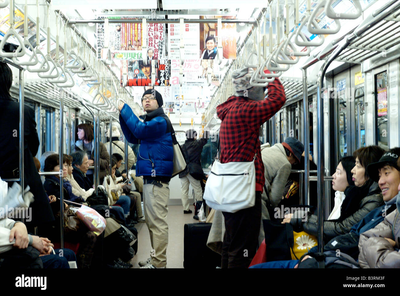 Commuters inside the Tokyo Metro (Subway) - Tokyo, Japan Stock Photo ...