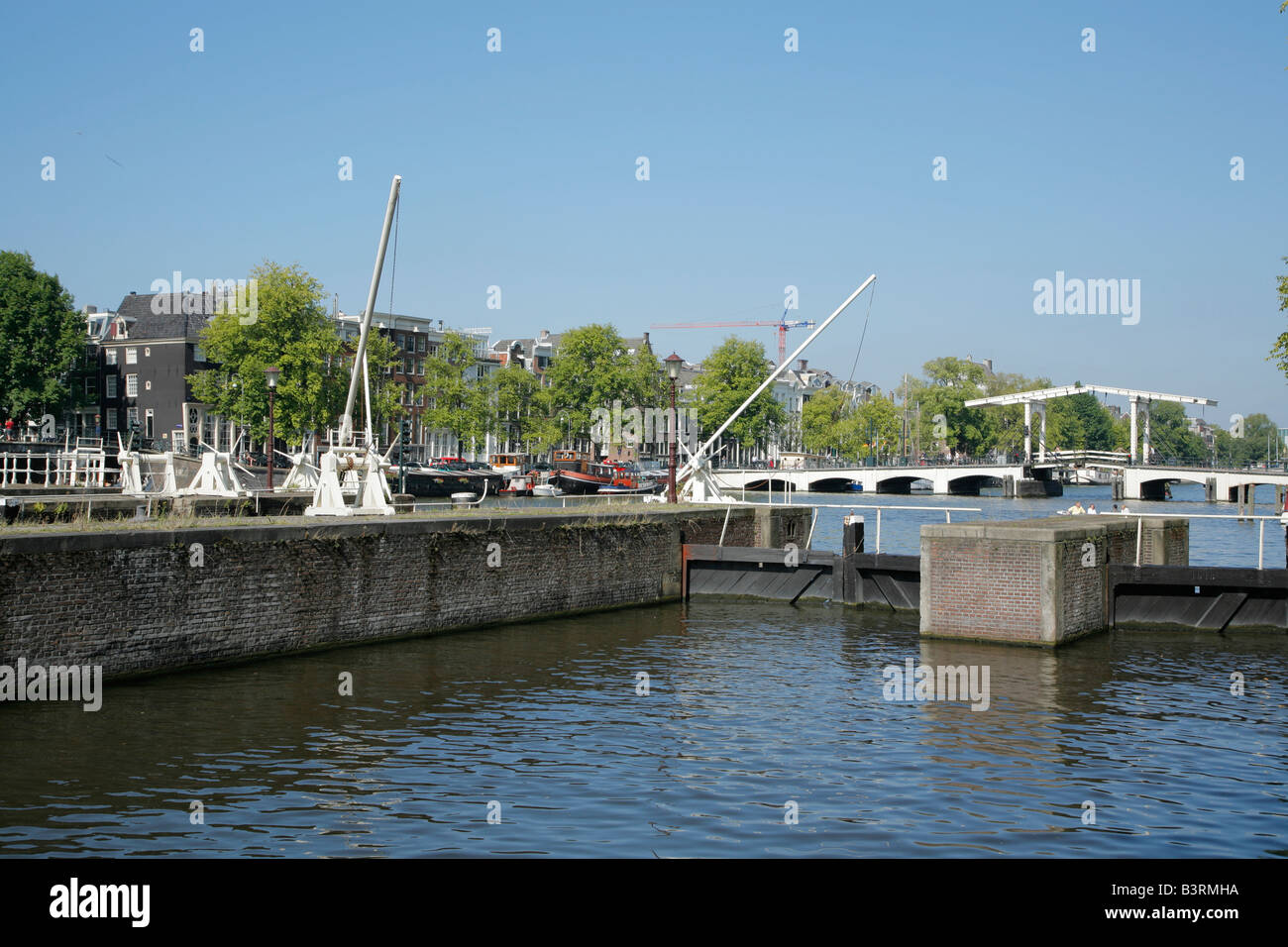 Lock gate on the canal, Amsterdam, Netherlands Stock Photo - Alamy