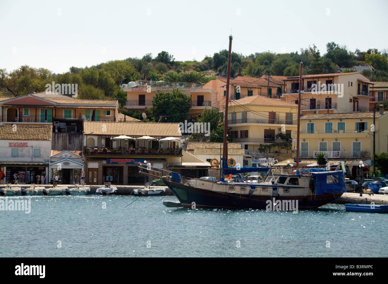 Kassiopi harbour, Corfu, Greece Stock Photo - Alamy