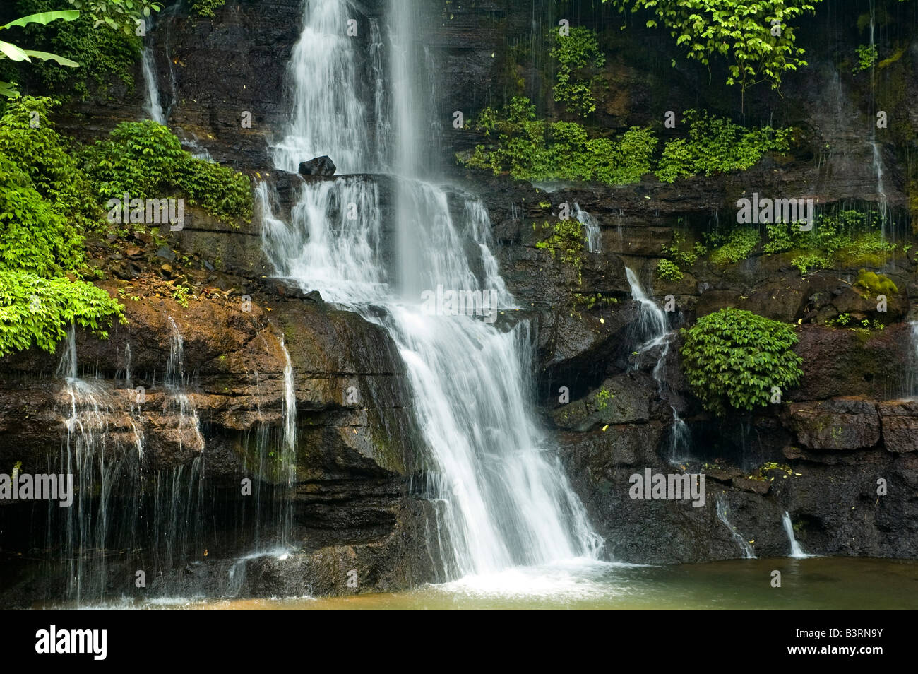 Beautiful scenery of Curug Orok Waterfall in Indonesia rainforest Stock ...