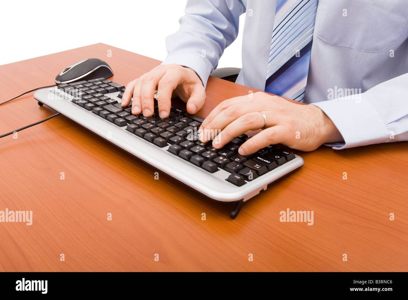 Man typing in the computer keyboard Stock Photo - Alamy