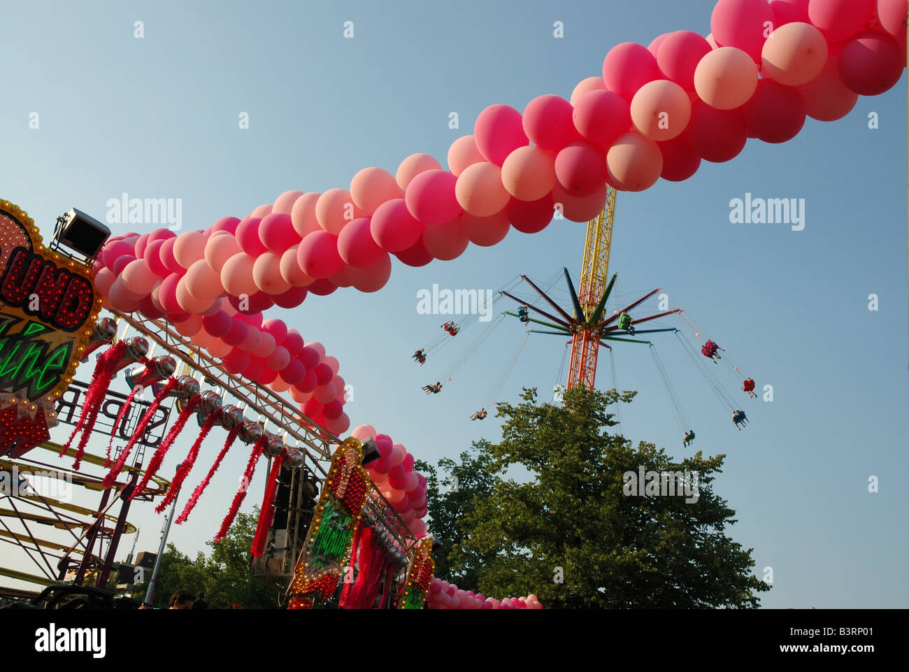 colourful fairground at dusk Tilburg Netherlands Stock Photo - Alamy