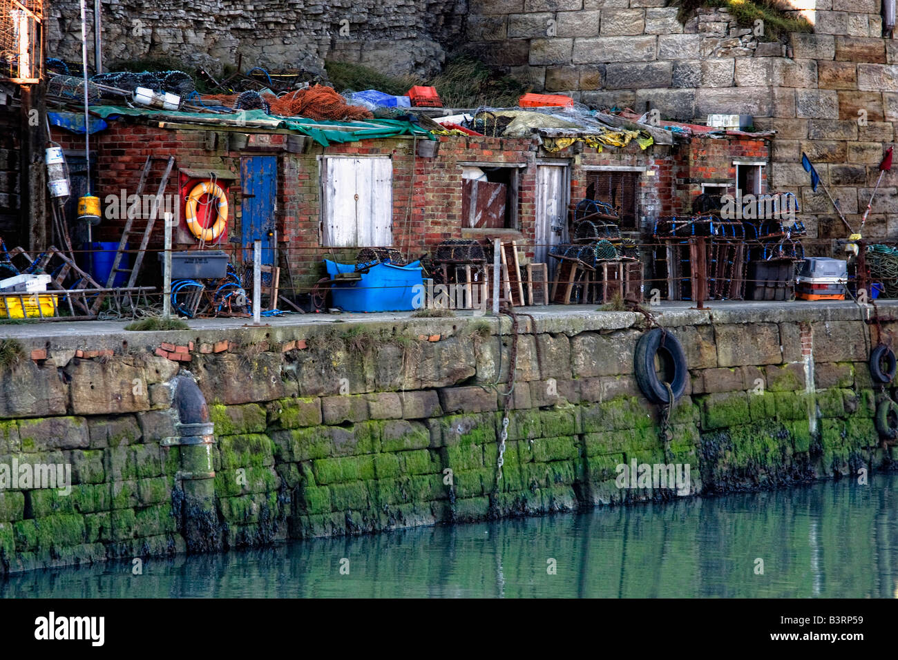 Buildings along waterfront and sea wall, Seaham, Teesside, England ...