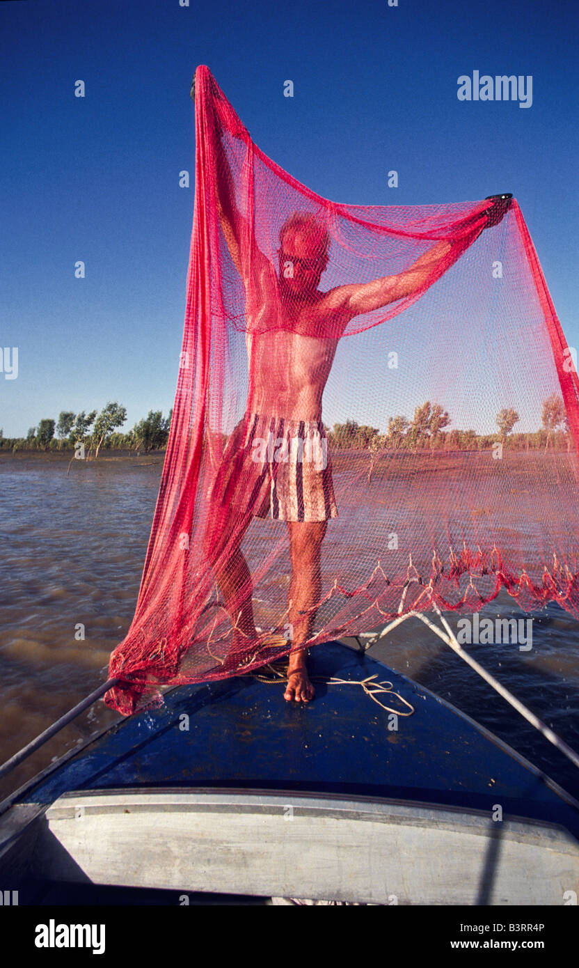 Man with fishing net, Australia Stock Photo - Alamy