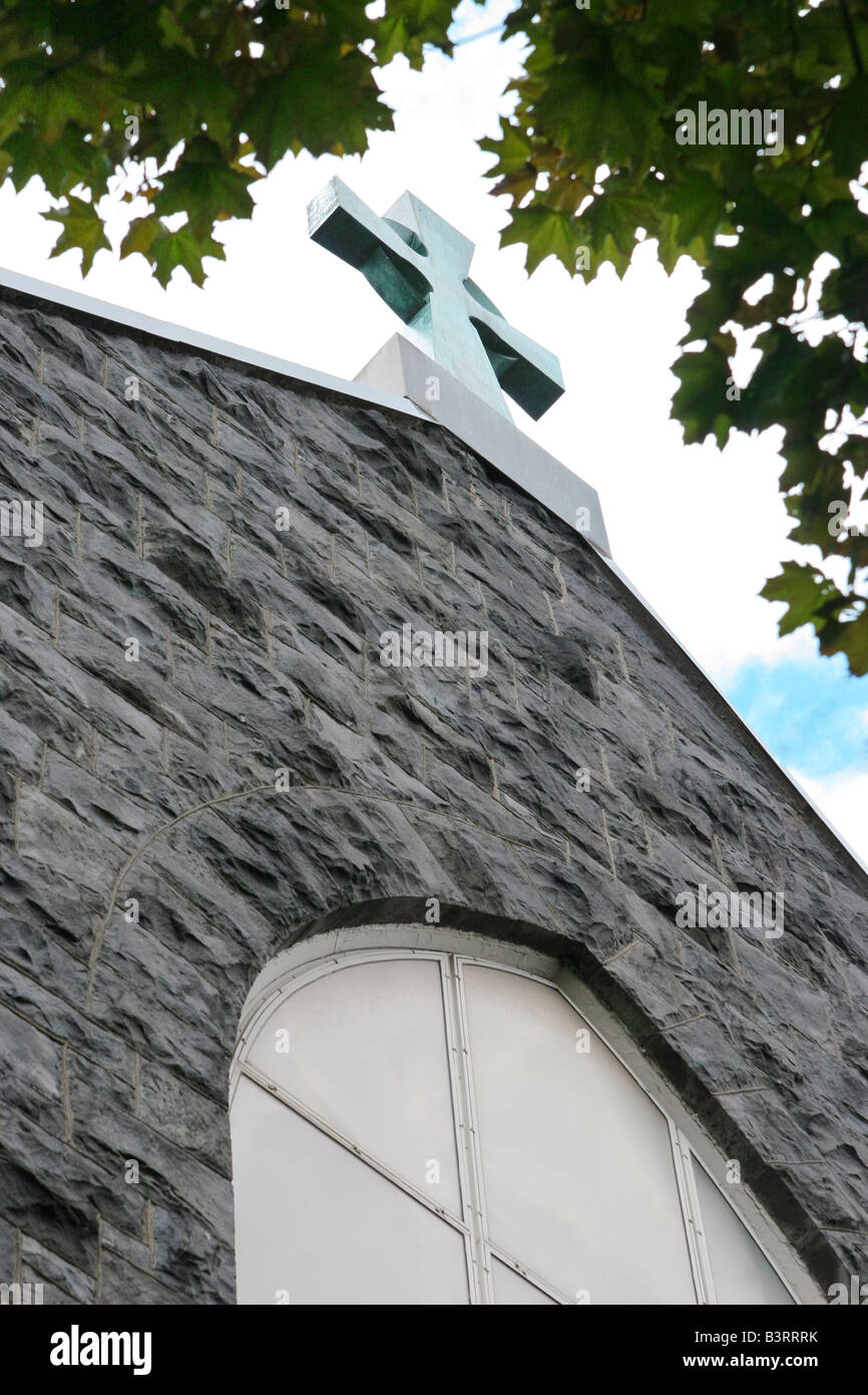 Low angle view of cross on top of church Stock Photo - Alamy