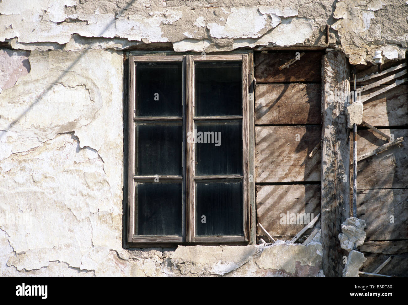Old ruined wooden window on house frontal Stock Photo - Alamy