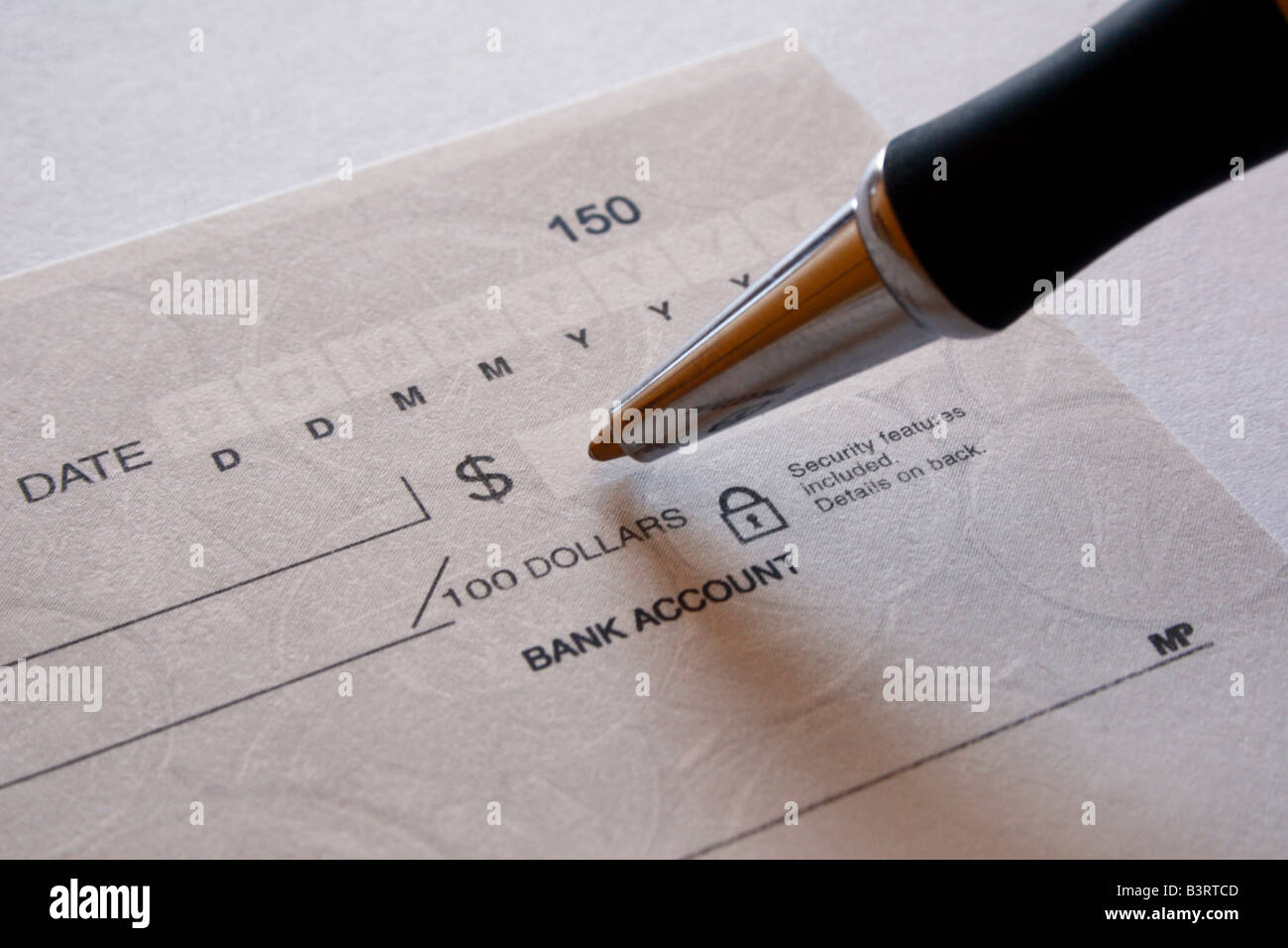 Signing cheques hi-res stock photography and images - Alamy