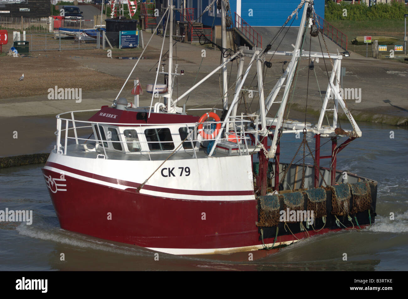 White fishing boat resting hi-res stock photography and images - Alamy