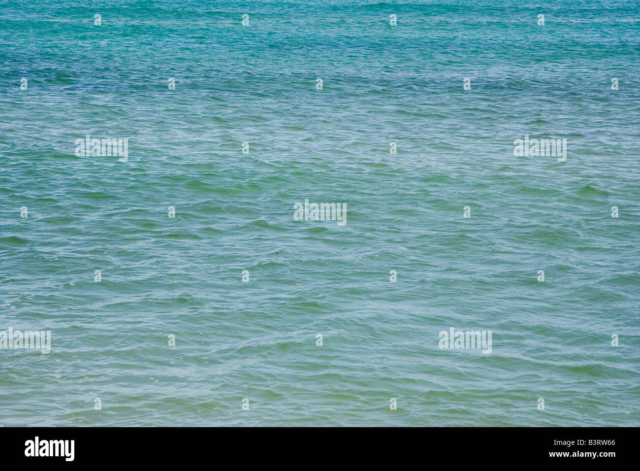 azure color of the mediterranean sea - summer background Stock Photo ...