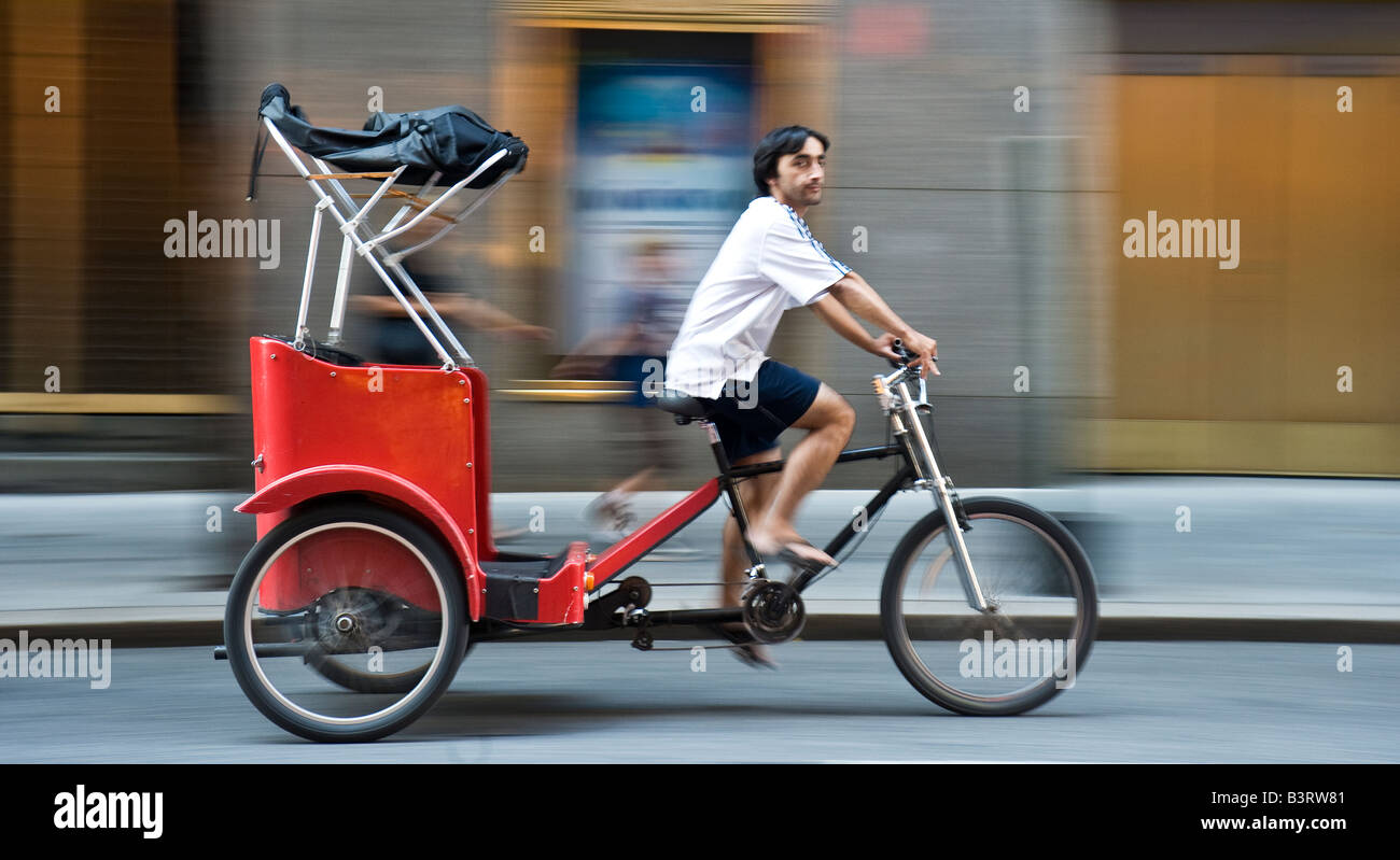 Rickshaw driver New York Stock Photo - Alamy