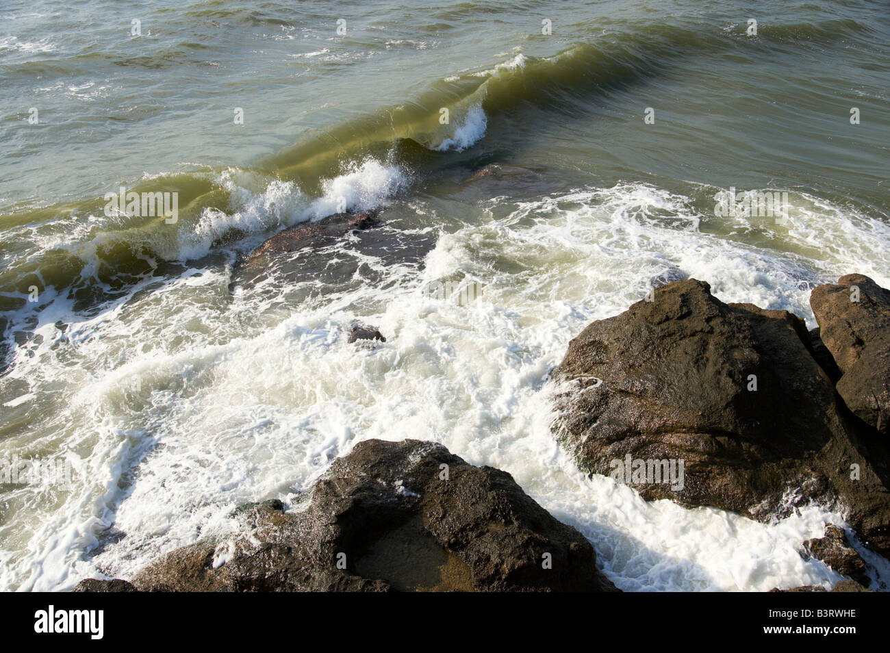Sea surf great wave break on coastline Stock Photo - Alamy