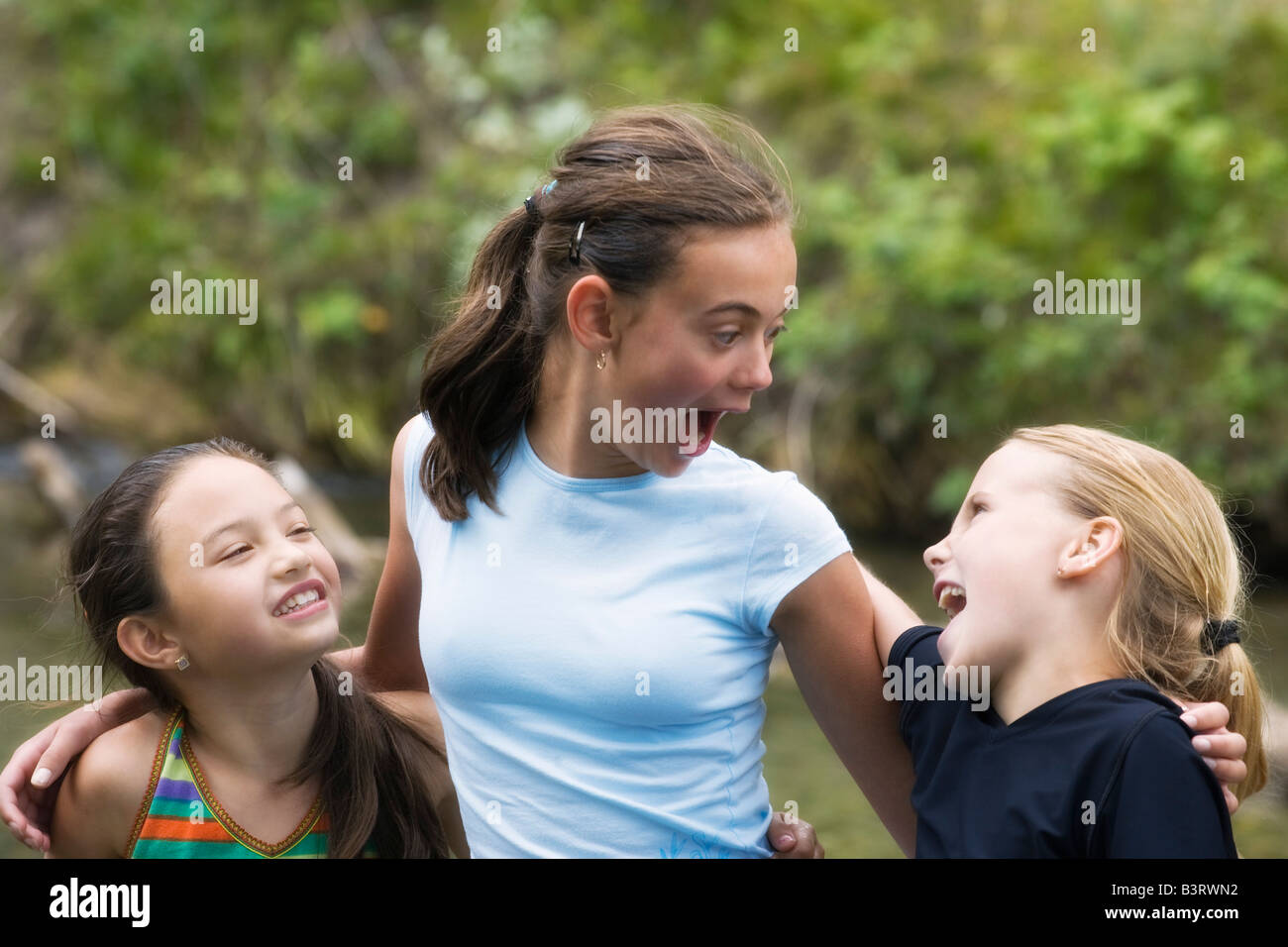 Three girls together Stock Photo - Alamy