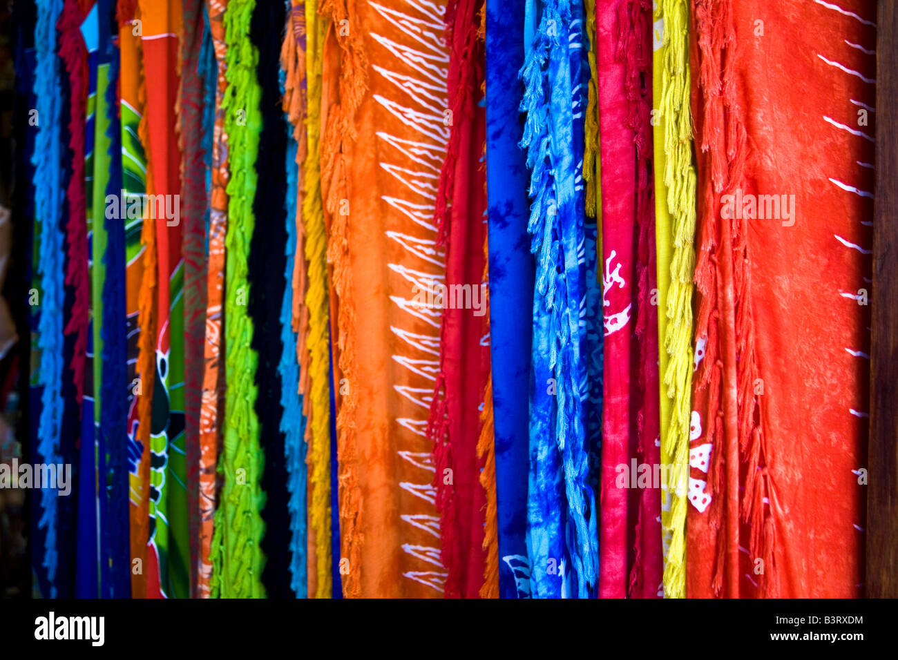 Multi-coloured fabric hanging Stock Photo - Alamy