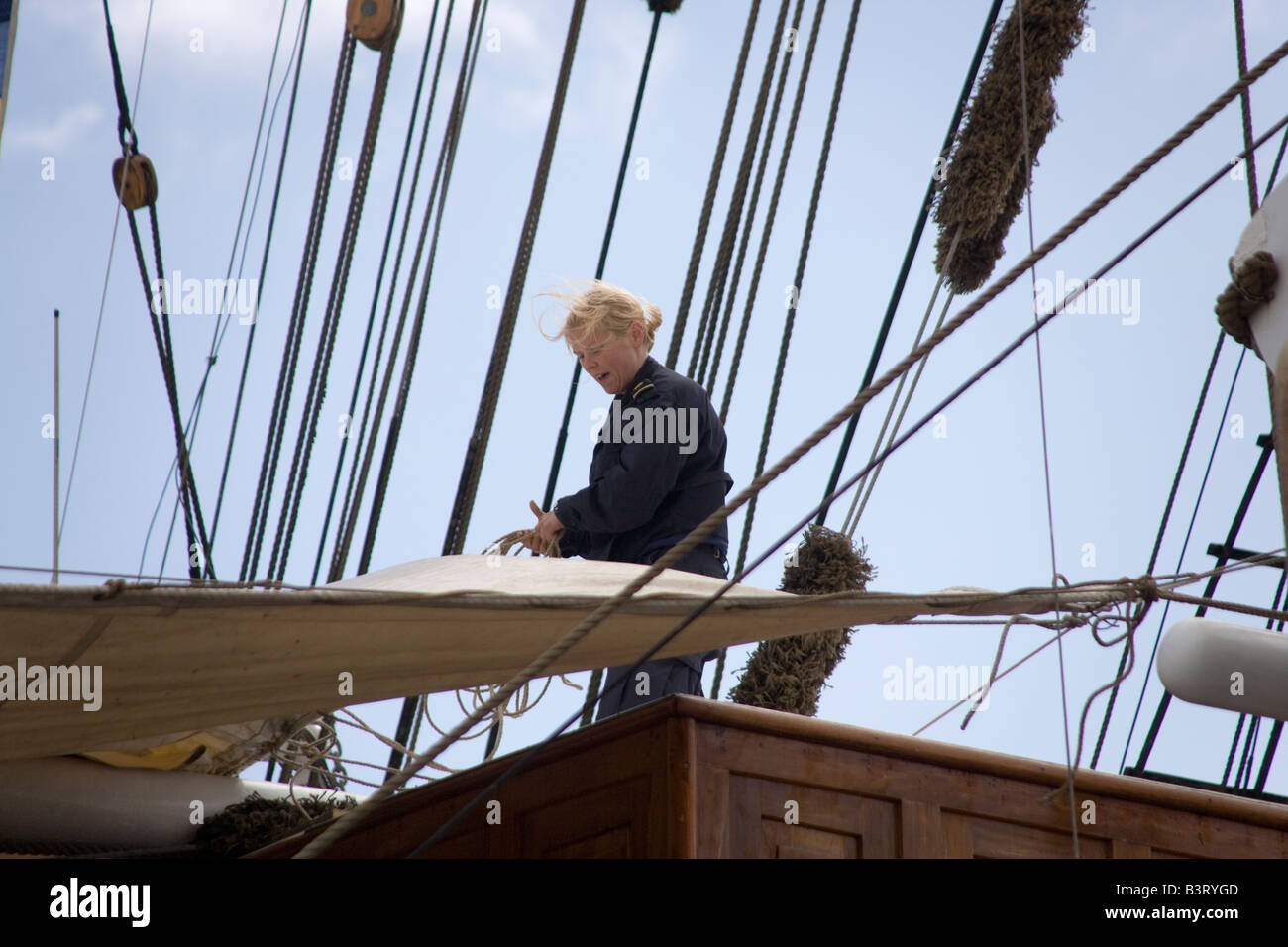 Female sailor working on a sailing ship at the Tall Ships race in ...