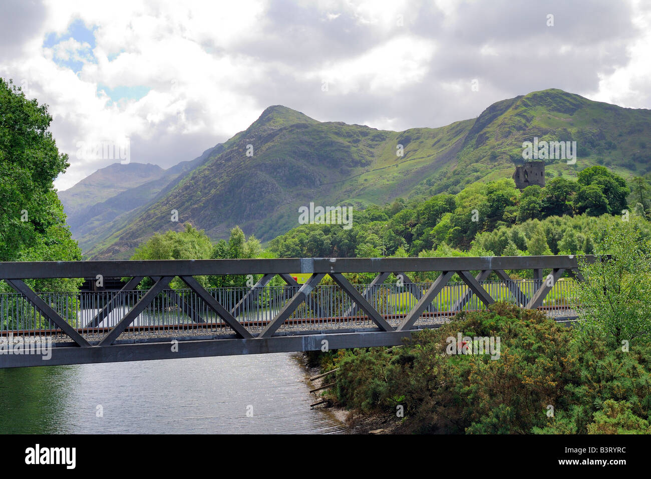 Footbridge across Llyn Padarn near Llanberis in North Wales with ...