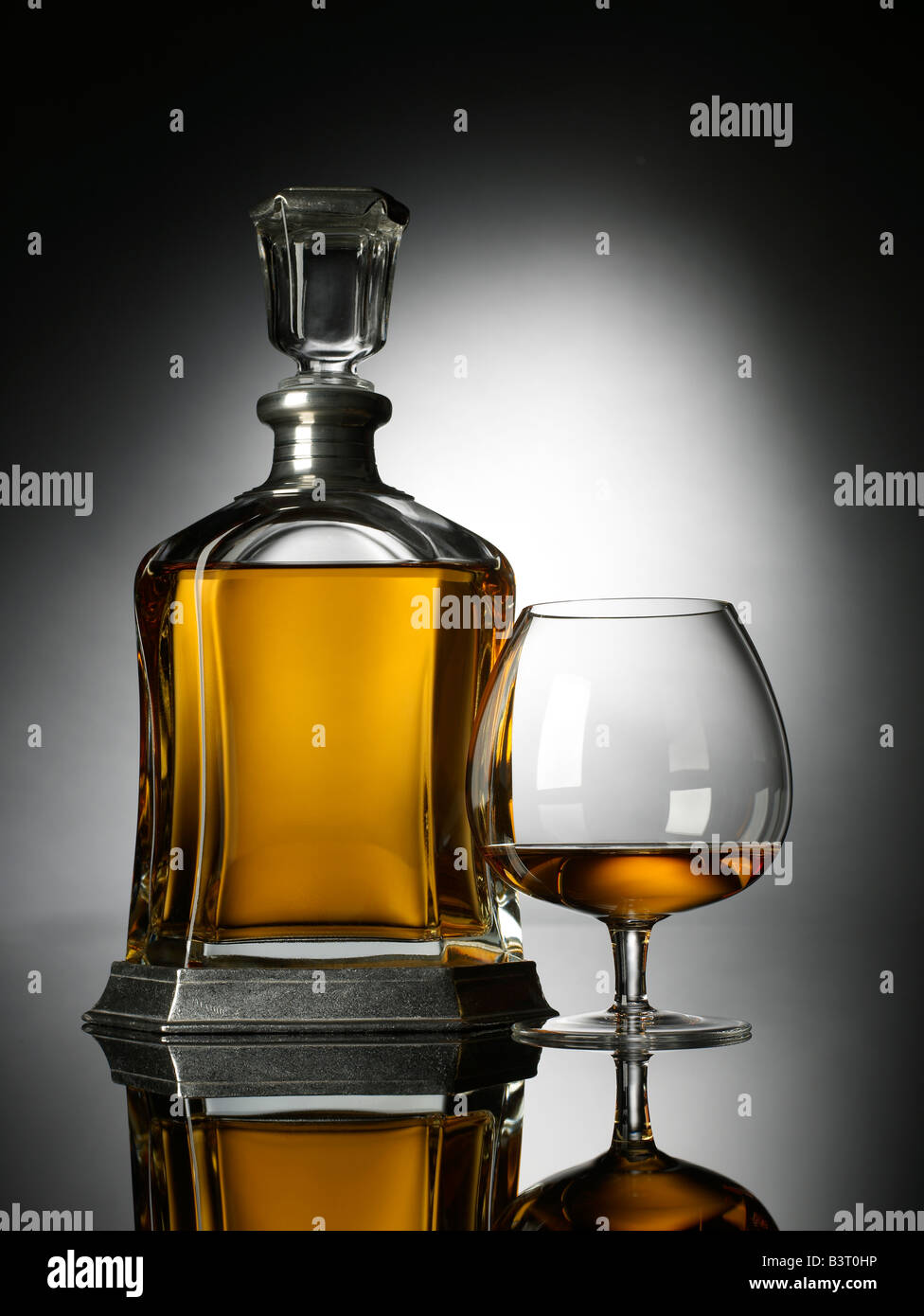 Brandy snifter decanter vertical Stock Photo - Alamy